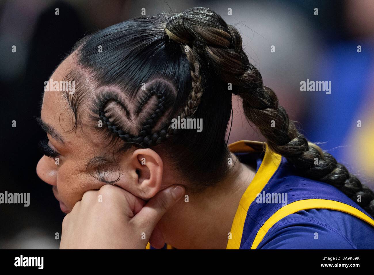 A heart is seen braided in LSU guard Last-Tear Poa's hair during the ...