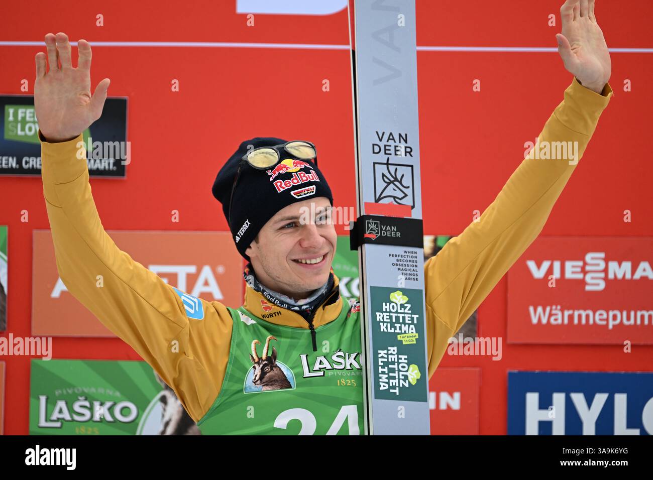 Third placed Andreas Wellinger of Germany celebrates after the Men Ski ...