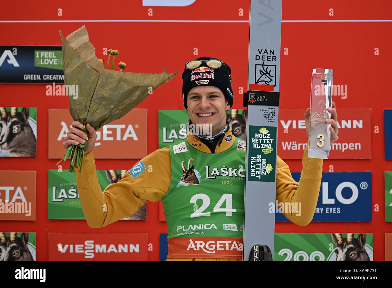 Third placed Andreas Wellinger of Germany celebrates after the Men Ski ...