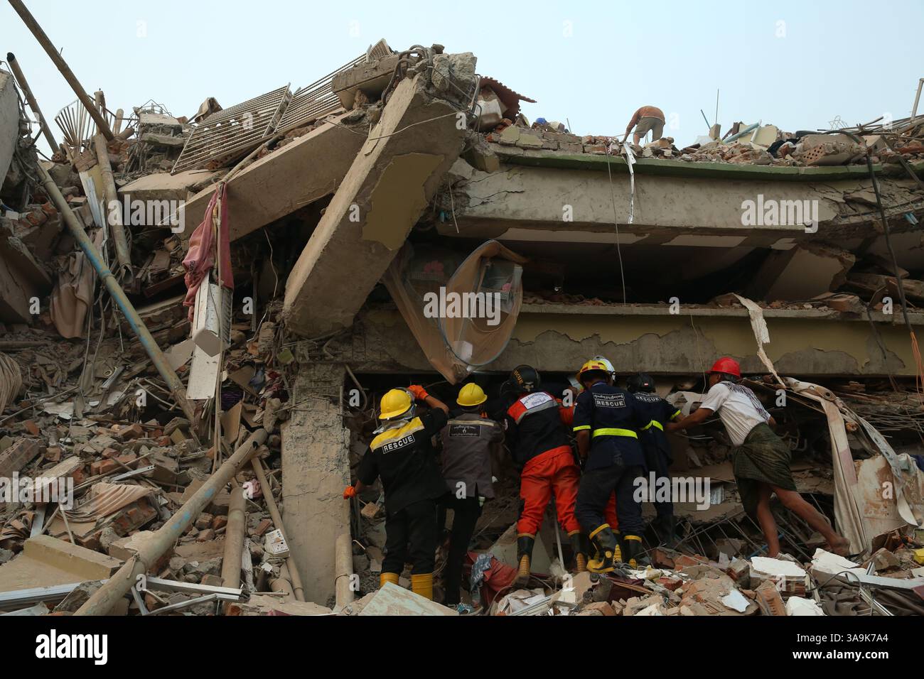 Beijing, Myanmar. 30th Mar, 2025. Rescuers carry out disaster relief ...
