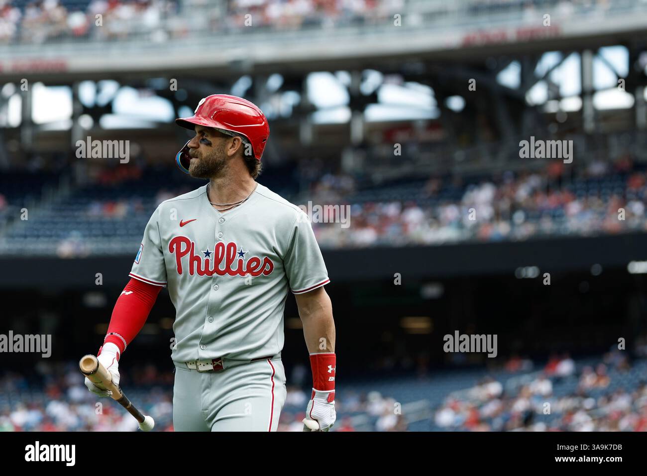 Philadelphia Phillies' Bryce Harper looks on after striking out against ...