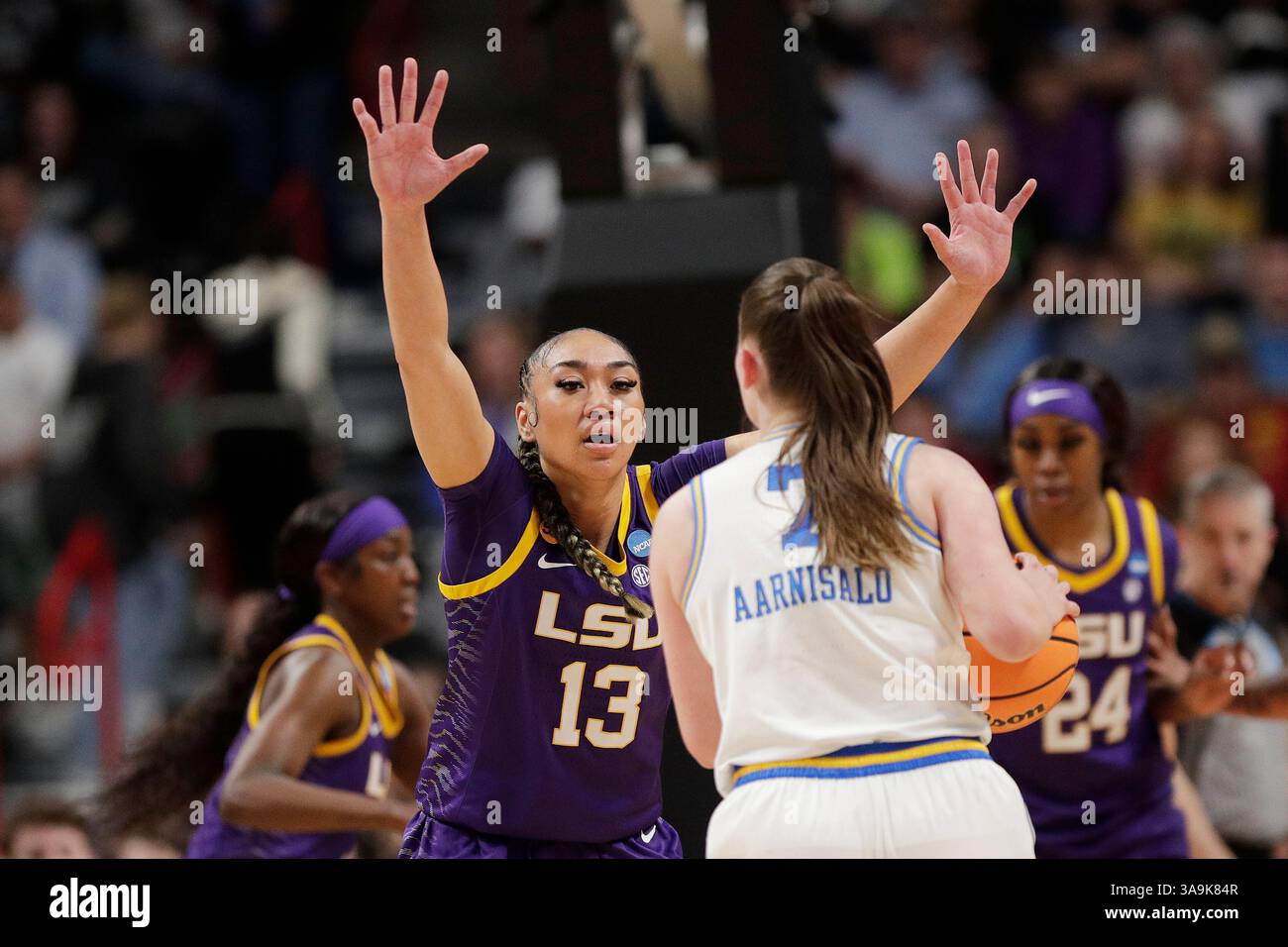 LSU guard Last-Tear Poa (13) defends UCLA guard Elina Aarnisalo during ...