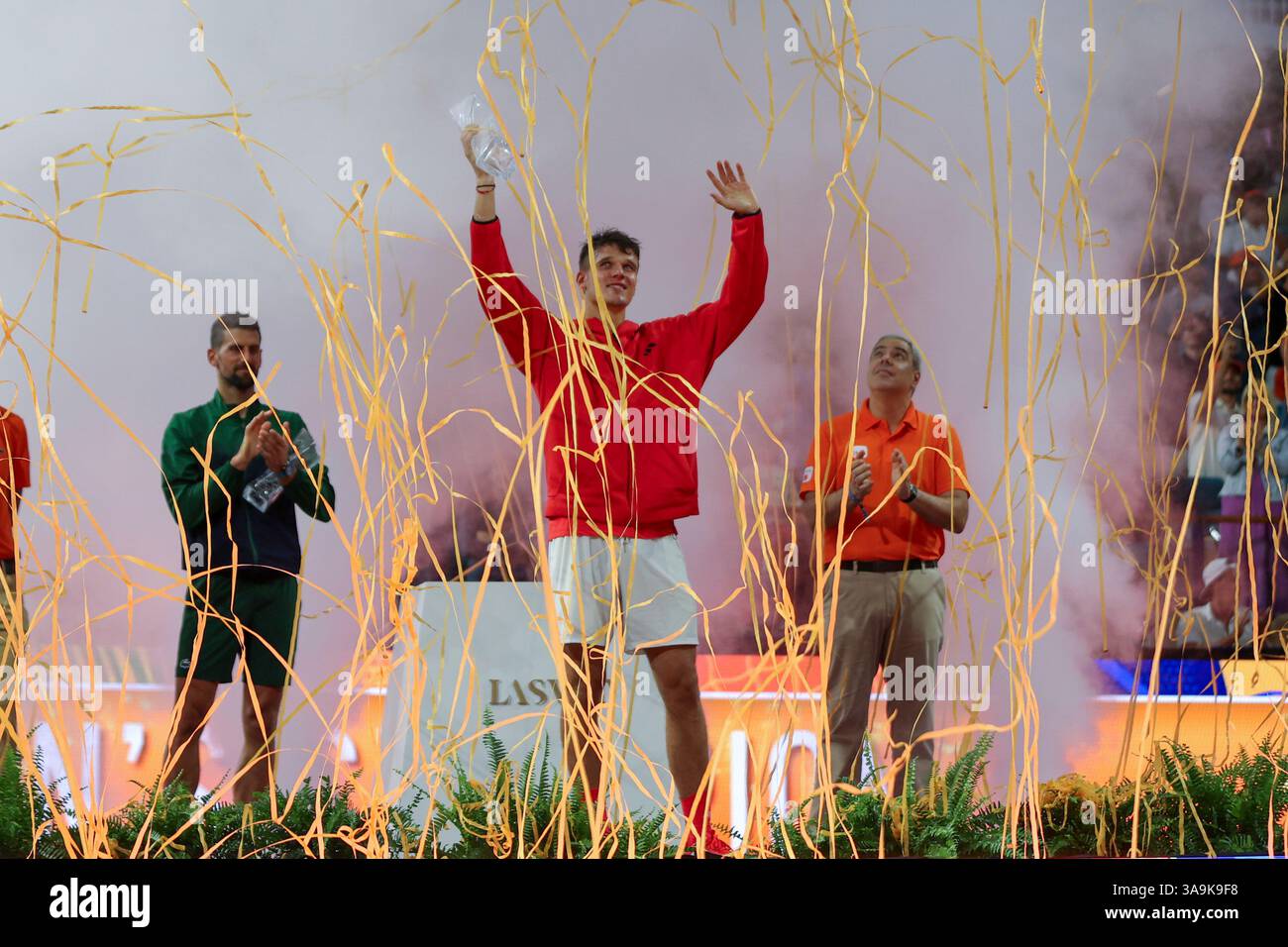 MIAMI GARDENS, FL - MARCH 30: Jakub Mensik (CZE) receives the Butch ...