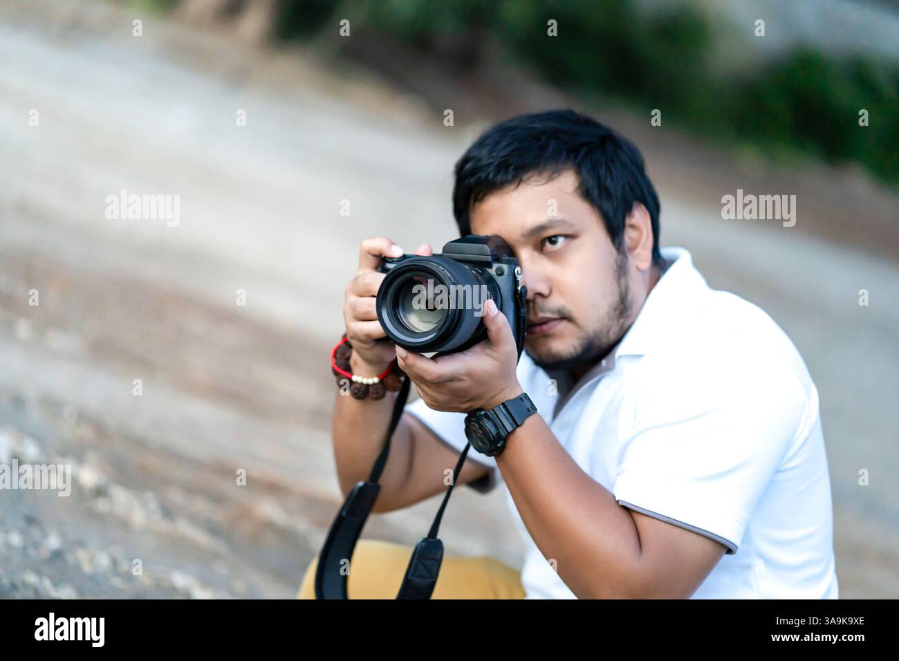 Professional Asian beard - mustache Camera man posture and focus in ...