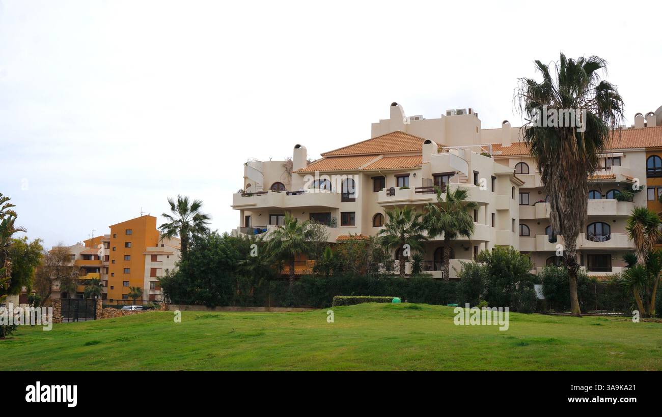 Alicante, Spain - March, 2025: View to apartment house with balconies ...