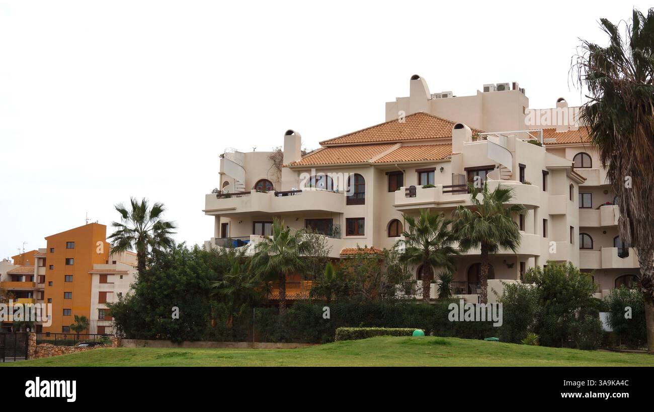 Alicante, Spain - March, 2025: View to apartment house with balconies ...