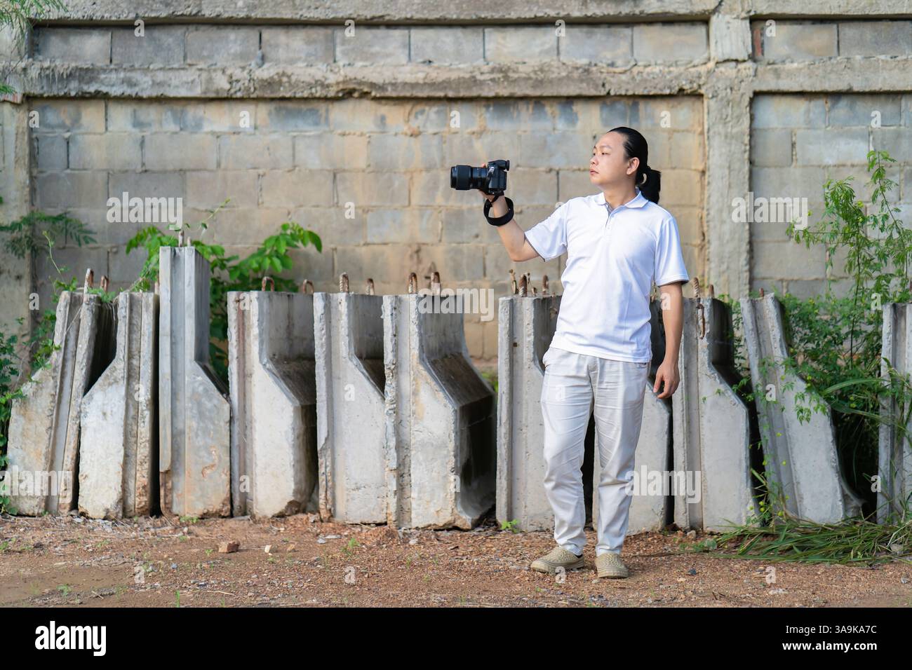 Professional Asian Chinese - Thai Camera man posture and focus in ...