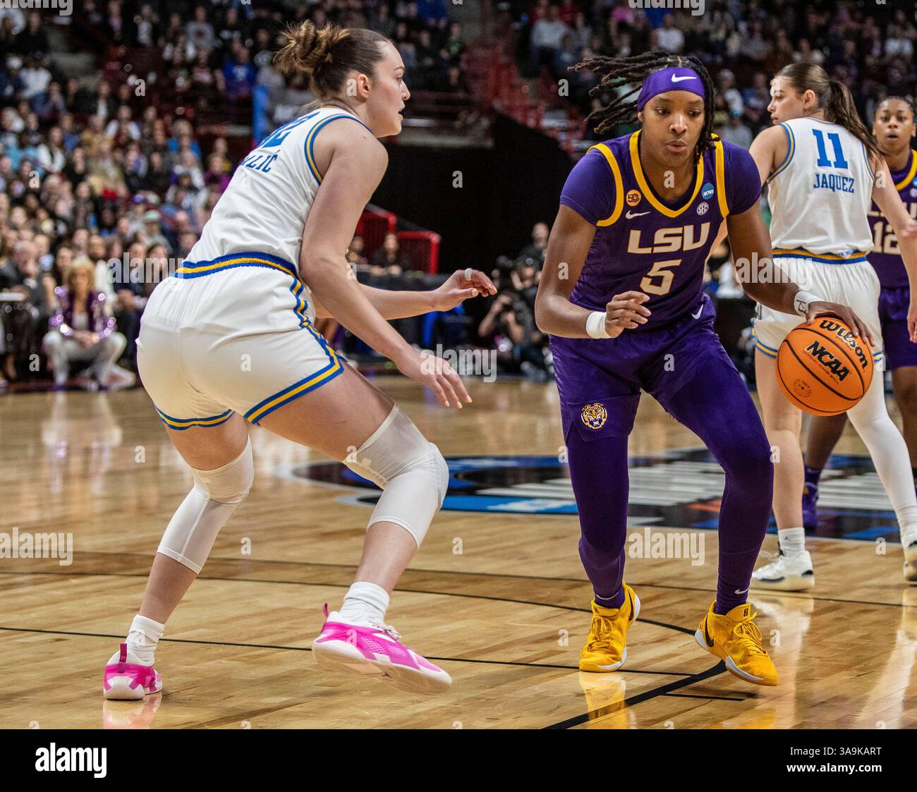 Mar 30 2025 Spokane WA U.S.A. LSU forward Sa'Myah Smith (5)drives to the hoop against UCLA ...