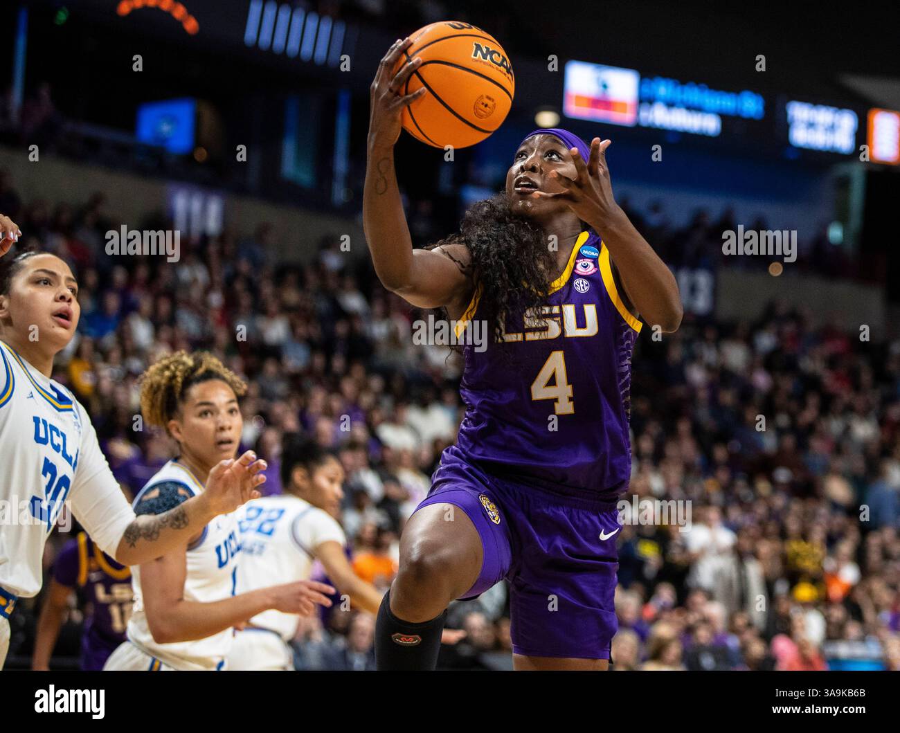 Mar 30 2025 Spokane WA U.S.A. LSU guard Flau'Jae Johnson (4)drives to the hoop during the NCAA ...