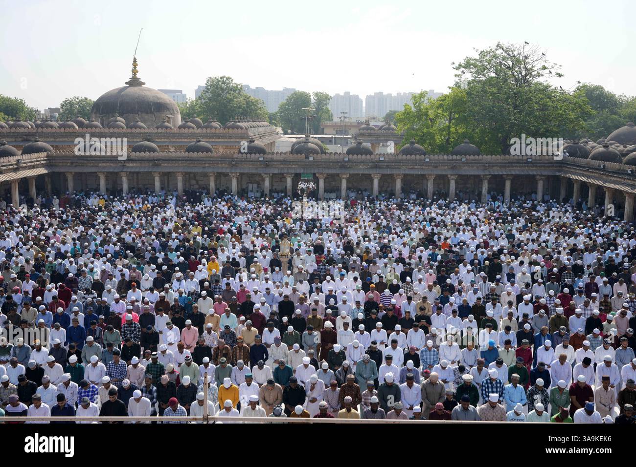 Muslims perform an Eid al-Fitr prayer marking the end of the holy ...