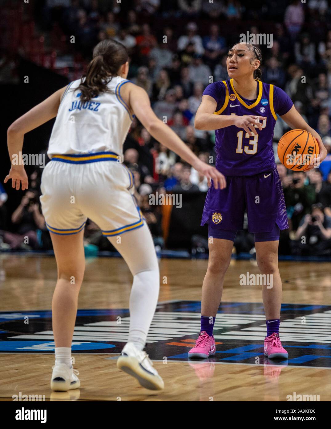 Mar 30 2025 Spokane WA U.S.A. LSU guard Last-Tear Poa (13)sets the play ...