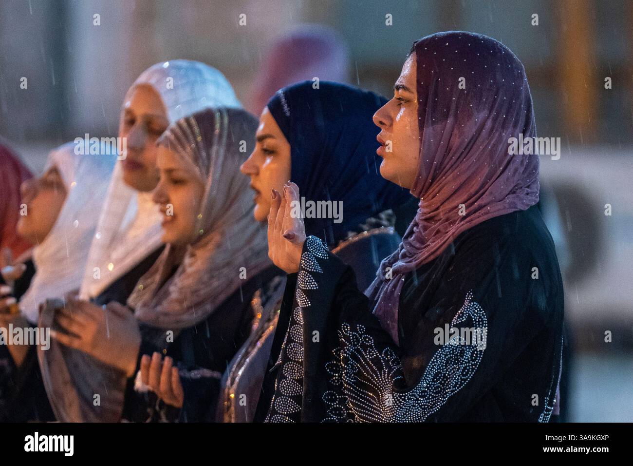 Muslims pray on the first day of Eid al-Fitr prayers at the Abdul-Qadir ...