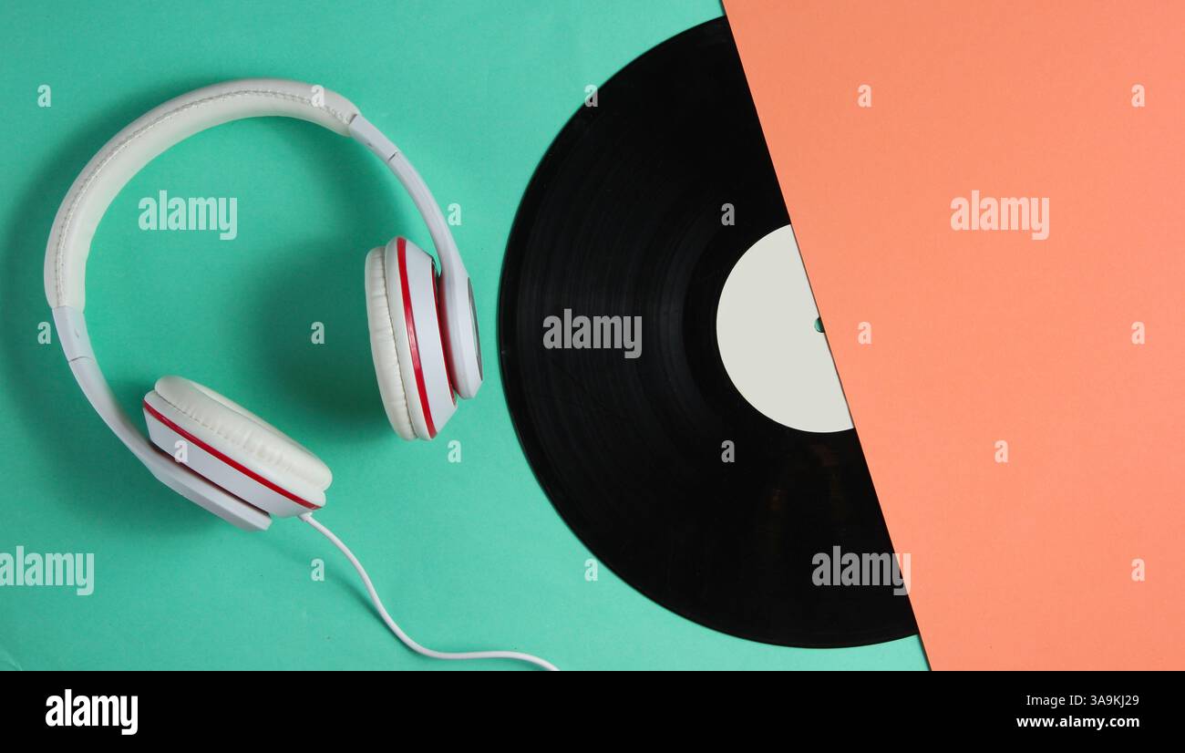 Retro style music concept. Classic headphones, half vinyl record on ...