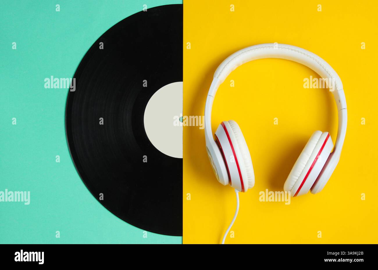 Retro style music concept. Classic headphones, half vinyl record on ...