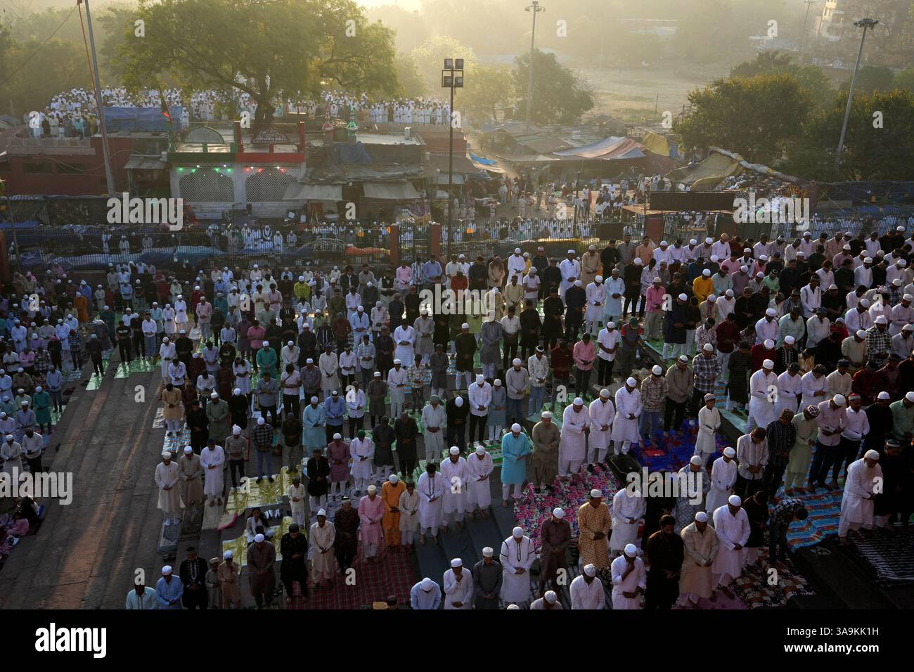 Muslims perform an Eid al-Fitr prayer marking the end of the holy ...
