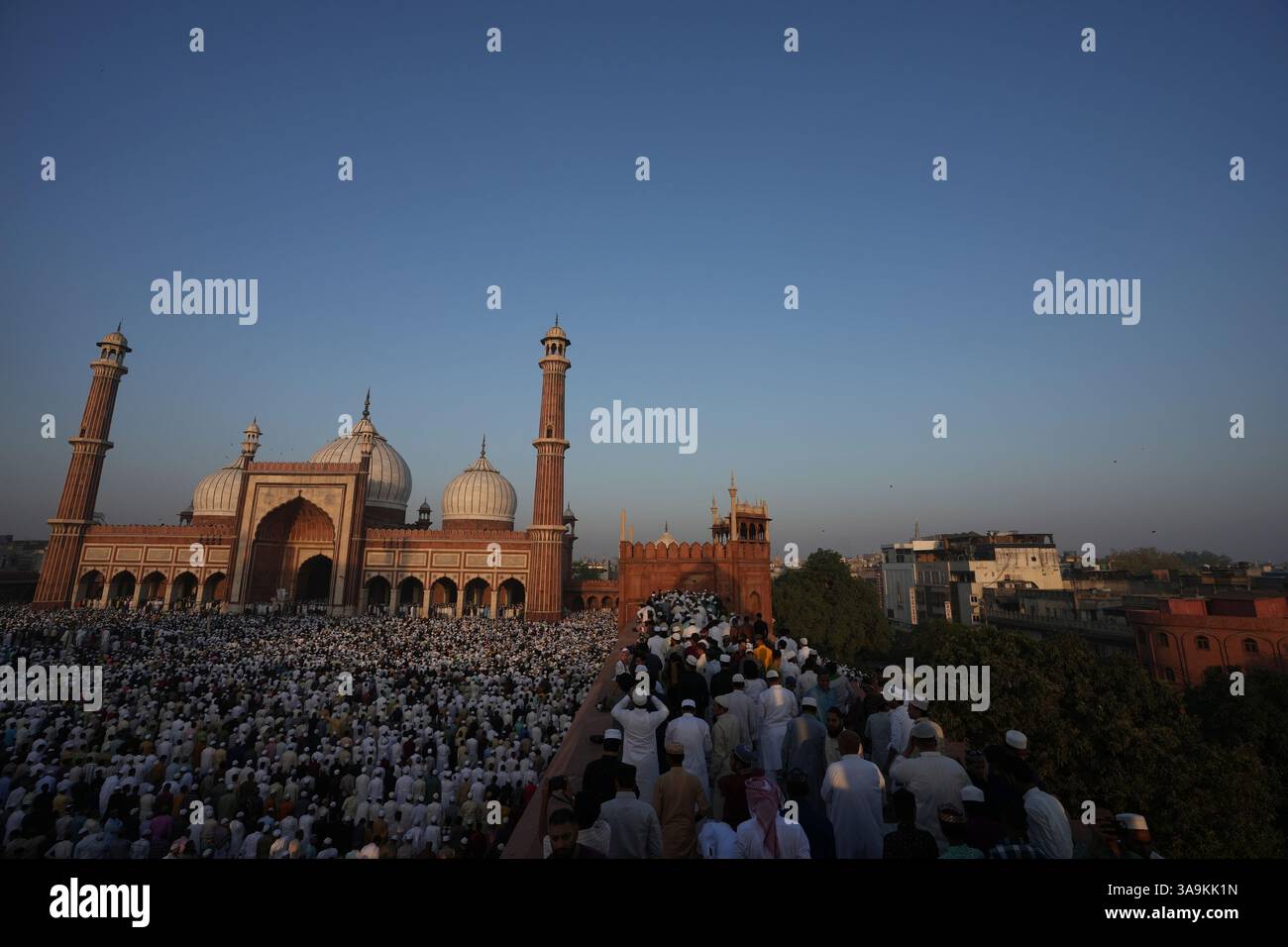 Muslims perform an Eid al-Fitr prayer marking the end of the holy ...
