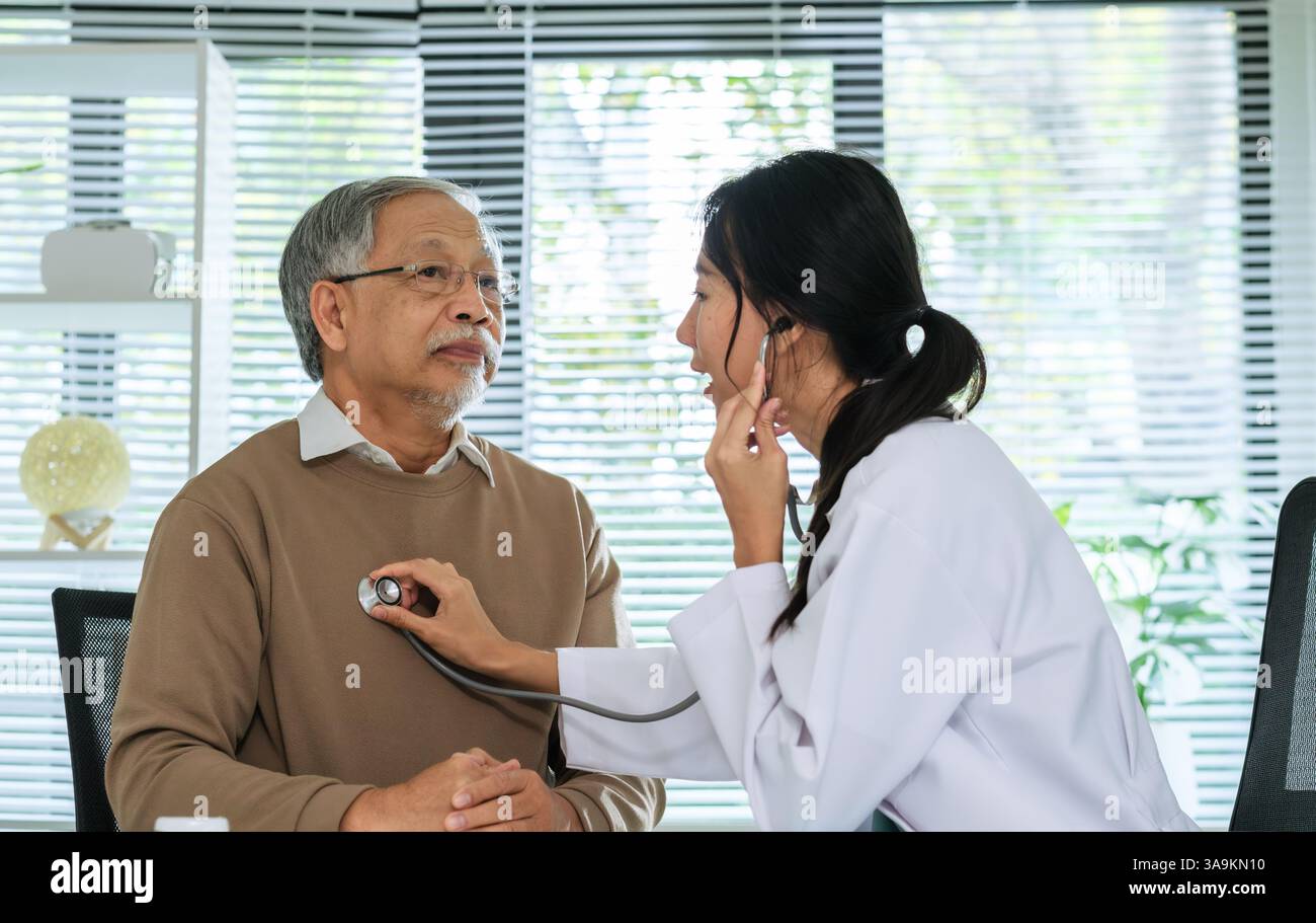 Doctor Using Stethoscope to Check Senior Patient's cardiology and ...