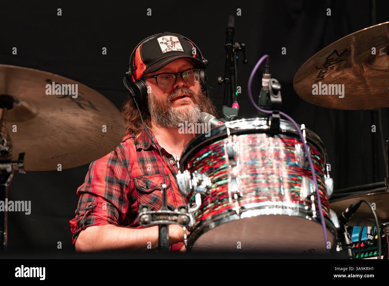 Rick McMurray seen playing drums live on stage with his band Ask at ...
