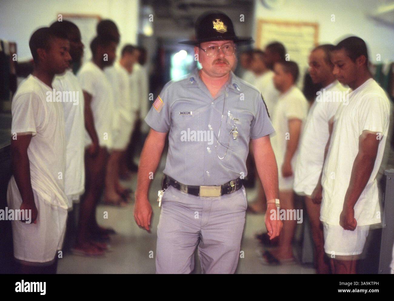 Jun 21, 1995; Schoharie, NY, USA; A guard walks through Shock Camp ...