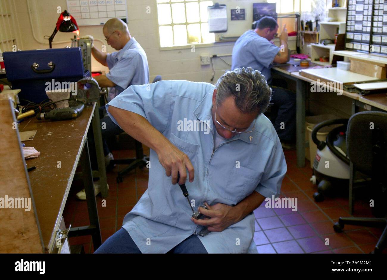 LEDE-- Prison inmates Dean Wang (cq) left, Raul Higgins (cq) and ...