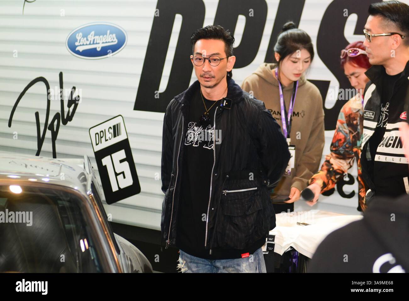 Hong Kong actor Sam Lee attends an activity in Suzhou City, east China ...