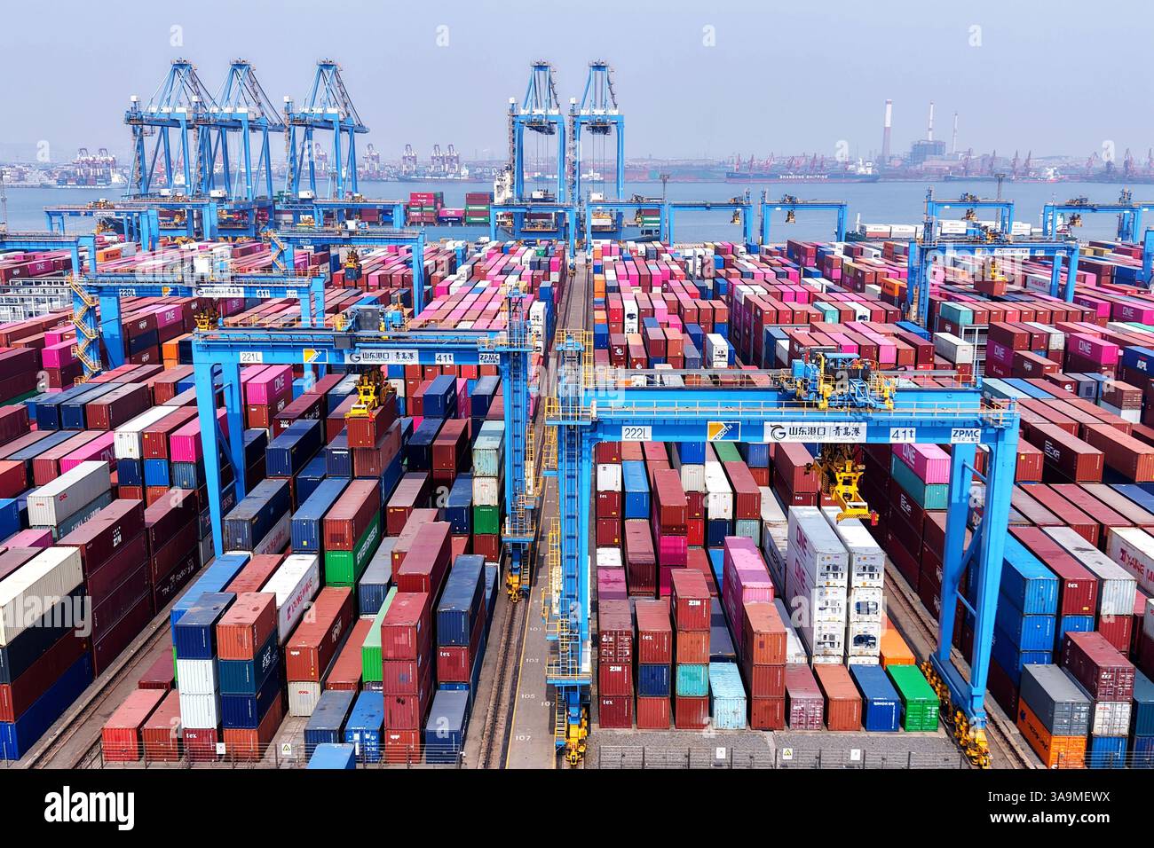 QINGDAO, CHINA - MARCH 31, 2025 - A container yard is used to load ...