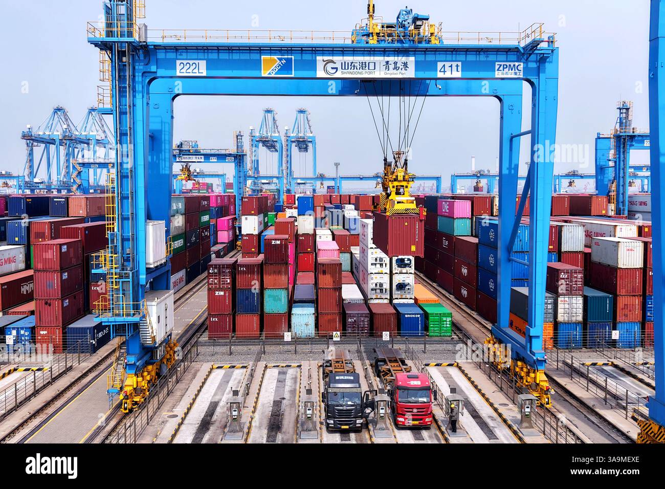 QINGDAO, CHINA - MARCH 31, 2025 - A container yard is used to load ...