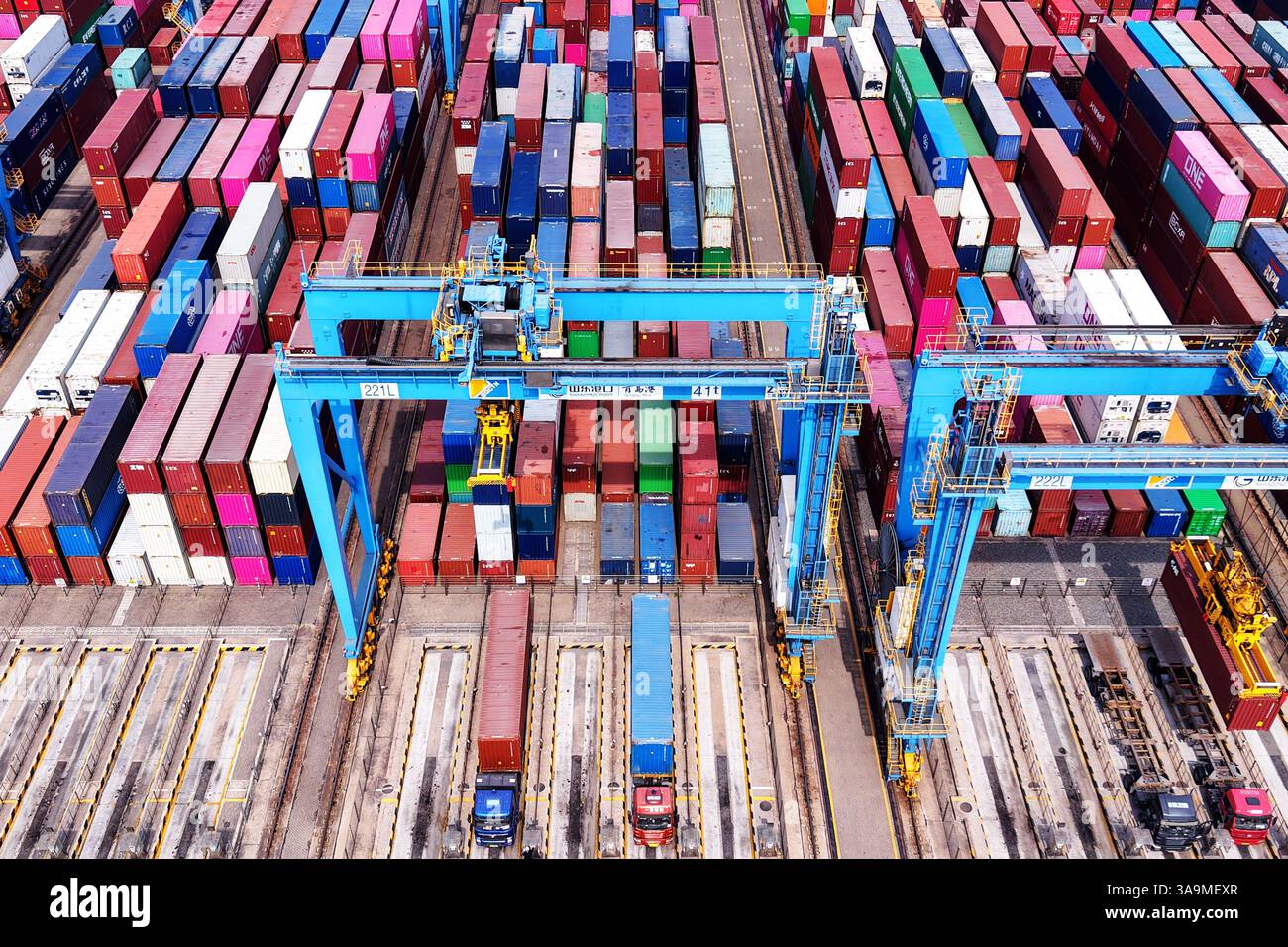 QINGDAO, CHINA - MARCH 31, 2025 - A container yard is used to load ...