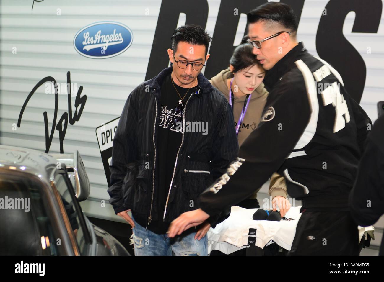 Hong Kong actor Sam Lee attends an activity in Suzhou City, east China ...