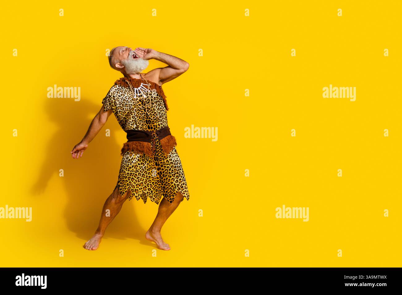 Full length photo of handsome cool neanderthal guy wear leoprad skin ...