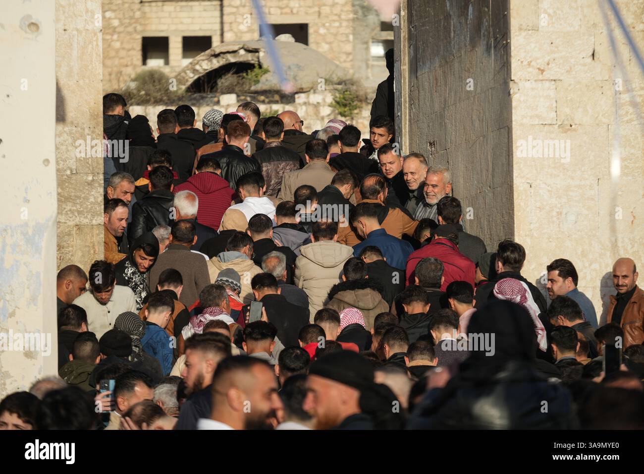 31 March 2025, Syria, Idlib: People arrive for Eid prayer on the first ...
