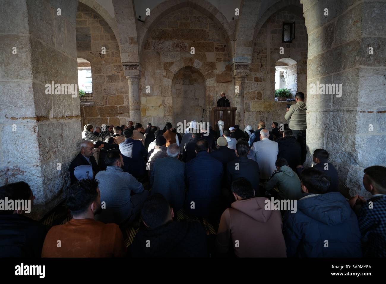 Idlib, Syria. 31st Mar, 2025. People listen to Eid prayer sermon on the ...