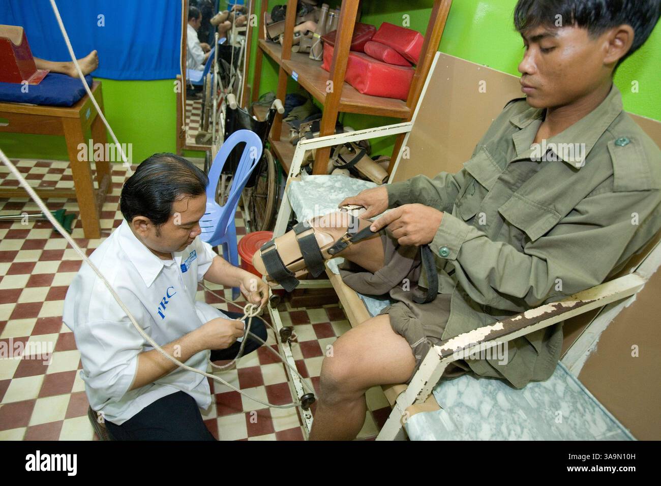Jun 26, 2006; Siem Reap, CAMBODIA; HAM KOMSUP, 28, undergoes physical ...