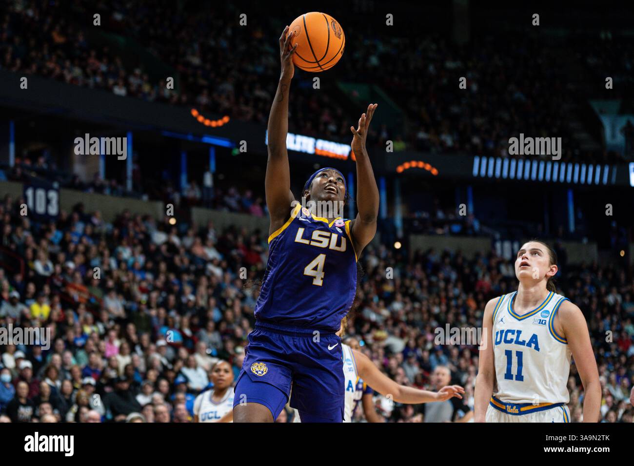 LSU Tigers guard Flau'Jae Johnson (4) scores during the NCAA Women's Championship - Regional 1 ...