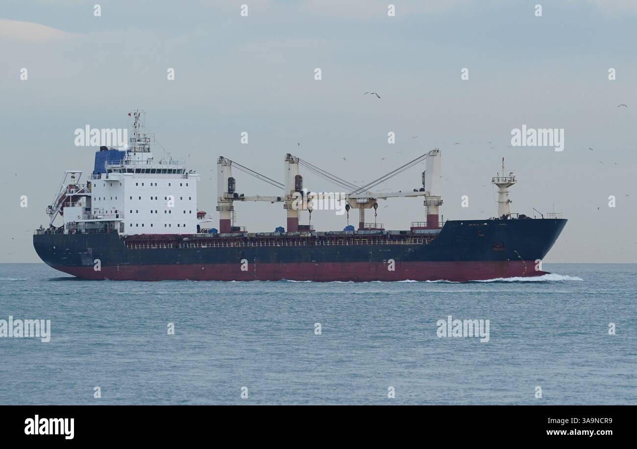 A Cargo Ship Carrying Products Between Ports Stock Photo - Alamy