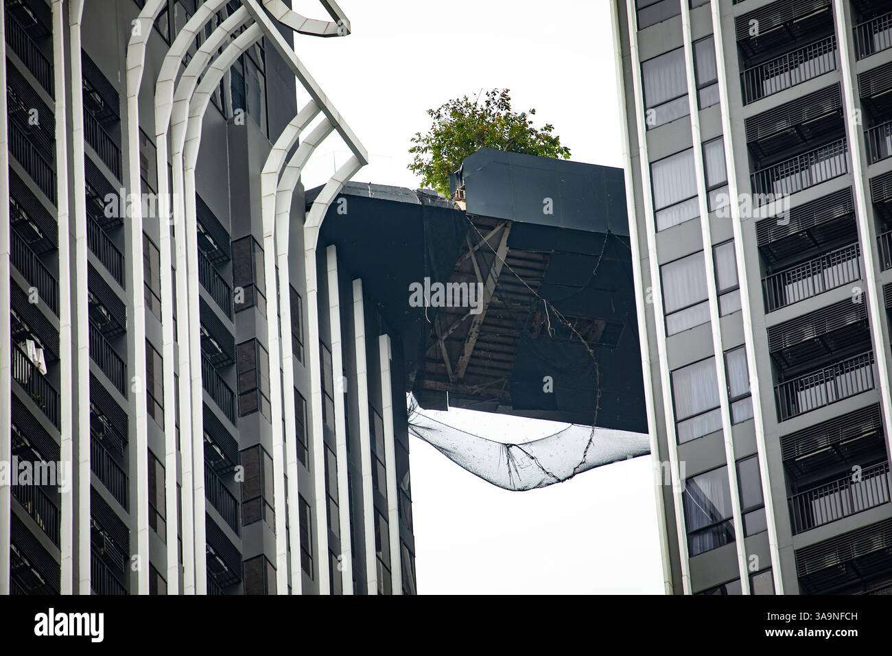 The shattered connecting bridge of the luxury "Park Origin Thonglor ...