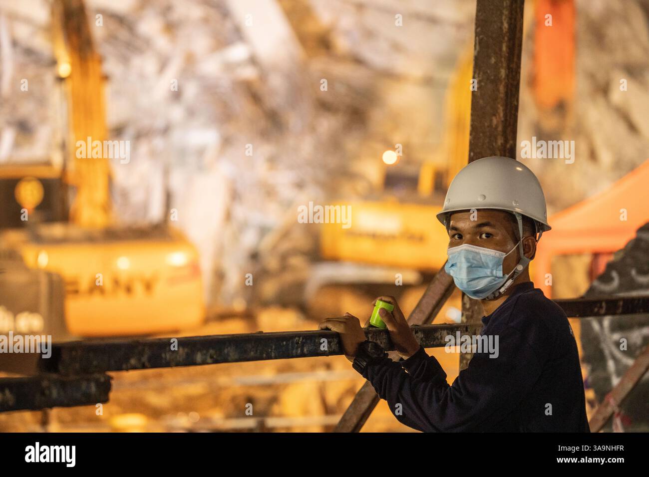 Rescue teams work tirelessly amidst the rubble of a collapsed ...