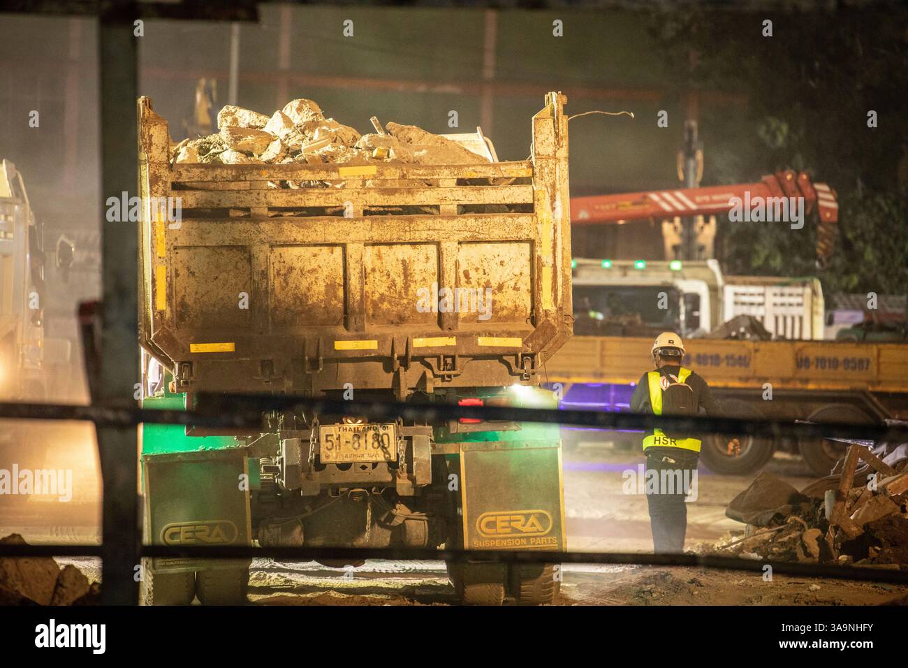 Rescue teams work tirelessly amidst the rubble of a collapsed ...