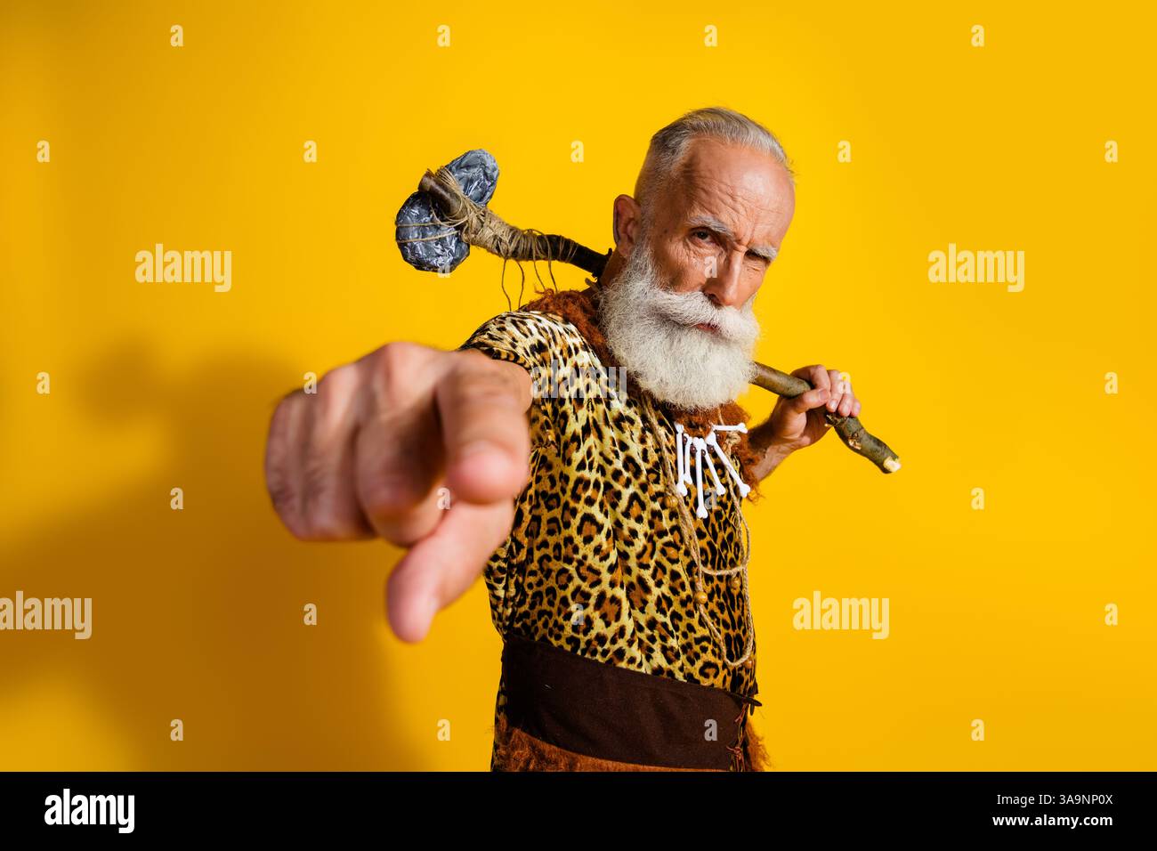 Photo of funny serious barbarian guy dressed leopard fur holding axe ...
