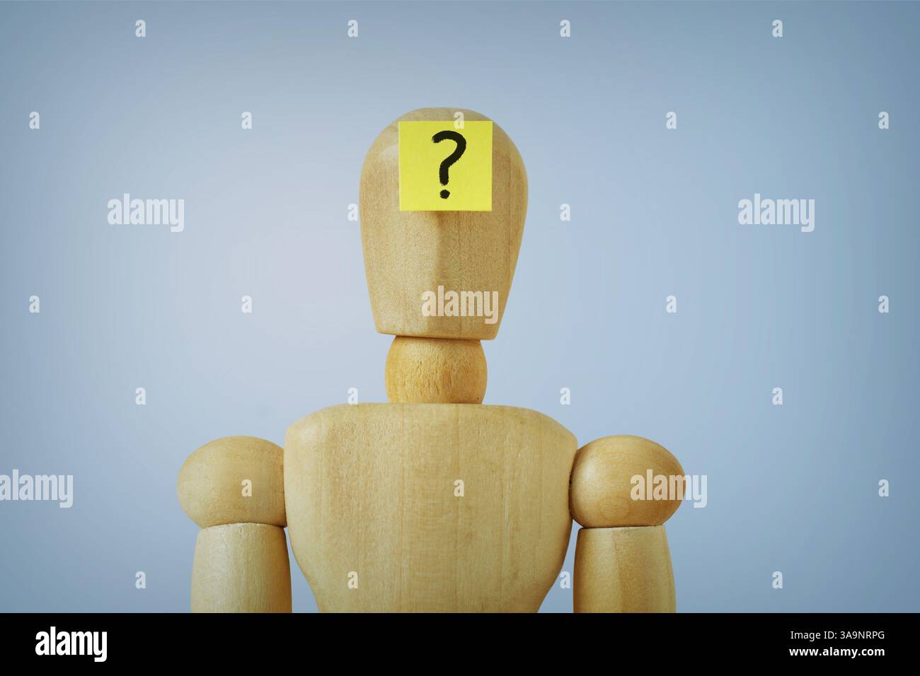 Wooden mannequin with sticky note on forehead with question mark Stock ...