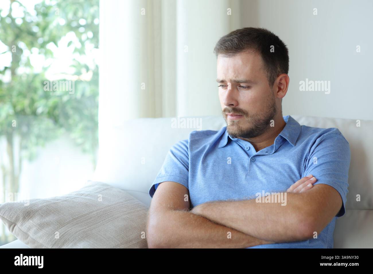 Sad man complaining alone hi-res stock photography and images - Alamy