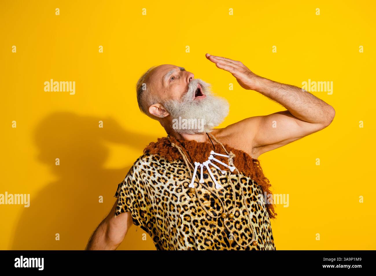 Photo of funny funky barbarian guy dressed leopard fur roaring blank ...