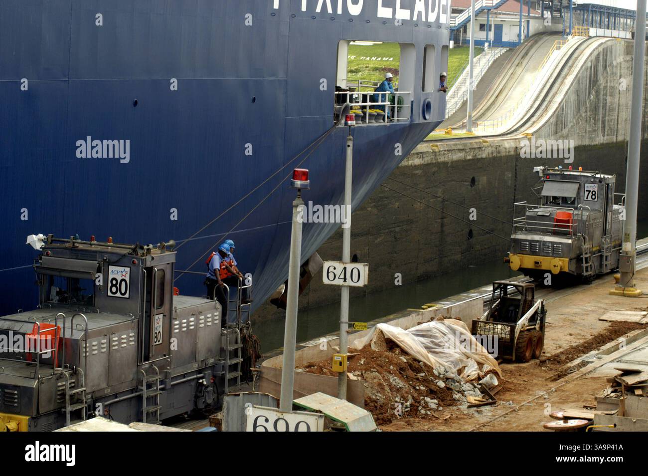Jan 02, 2006; Panama Canal, PANAMA; Electric locomotives keep a vessel ...