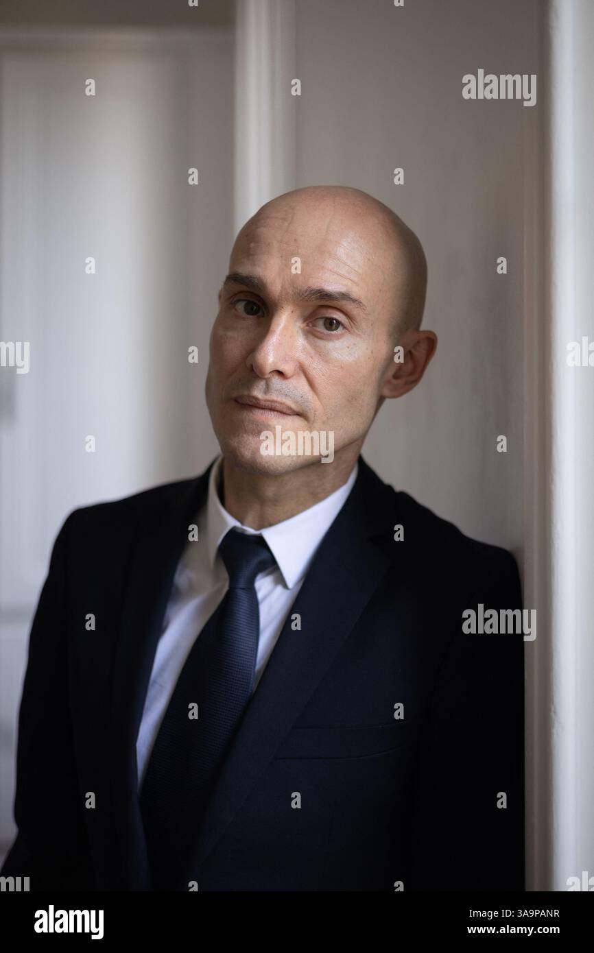 Portrait of lawyer of Anne Vedovini, Julien Pinelli in his office in ...