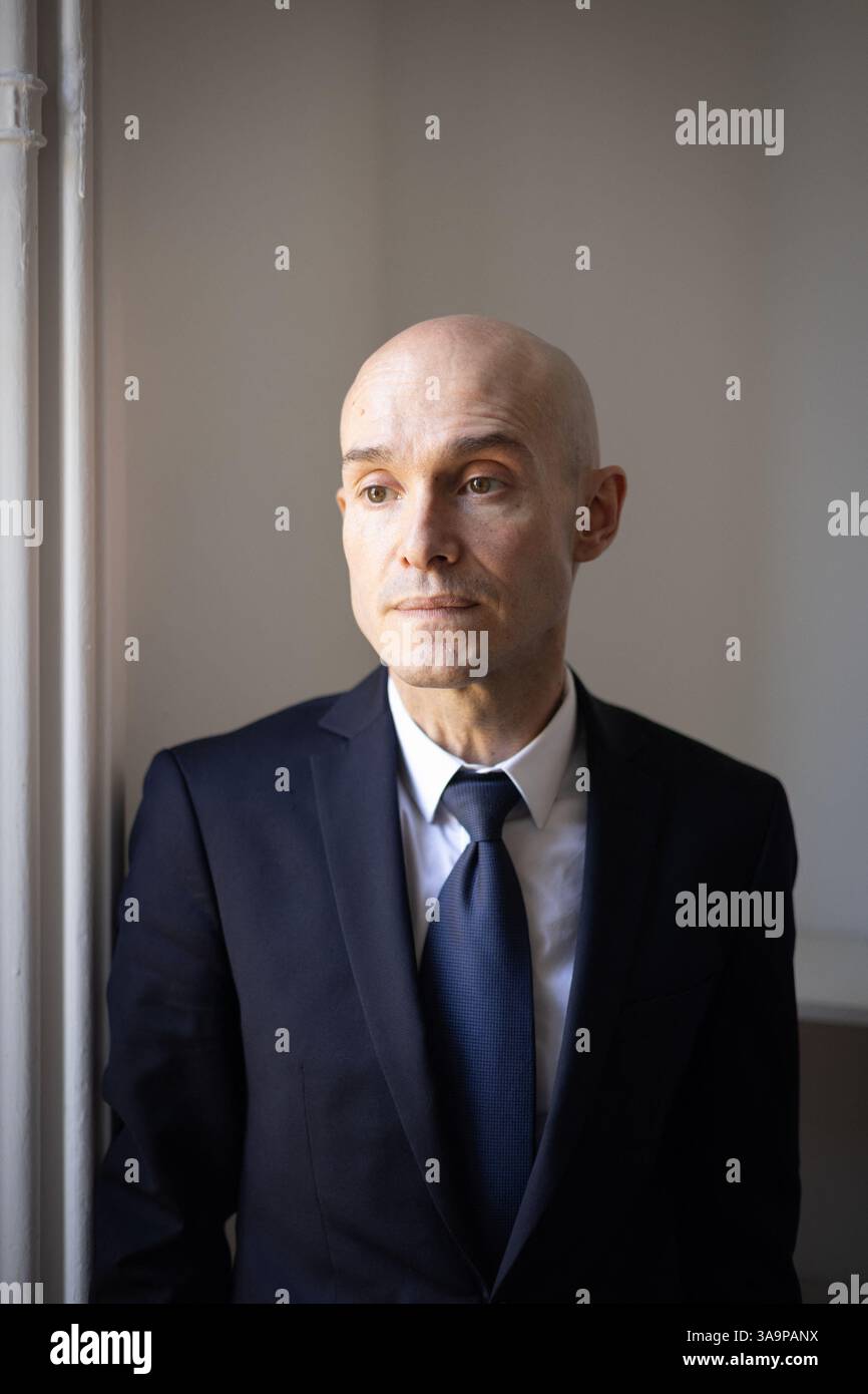 Portrait of lawyer of Anne Vedovini, Julien Pinelli in his office in ...