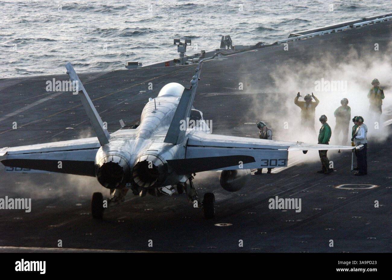 Feb 21, 2006; PERSIAN GULF; US Navy (USN) flight deck crewmembers ...