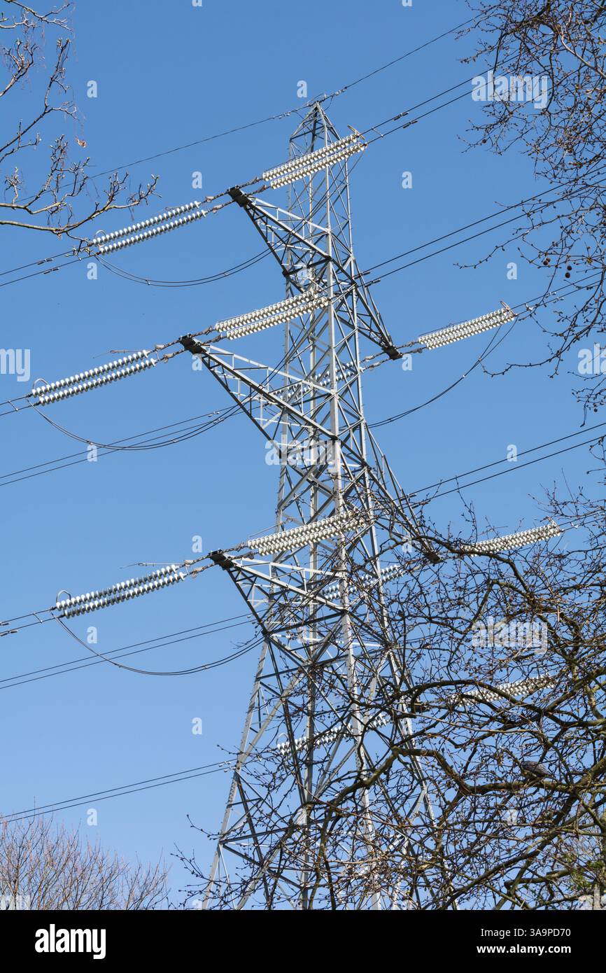 Closeup of National Grid high-voltage electricity pylon and power lines ...
