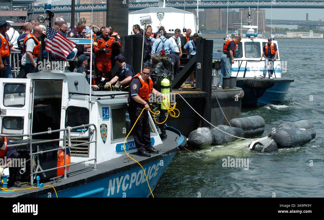 Jun 14, 2005; New York, NY, USA; Police and firefighters at work ...