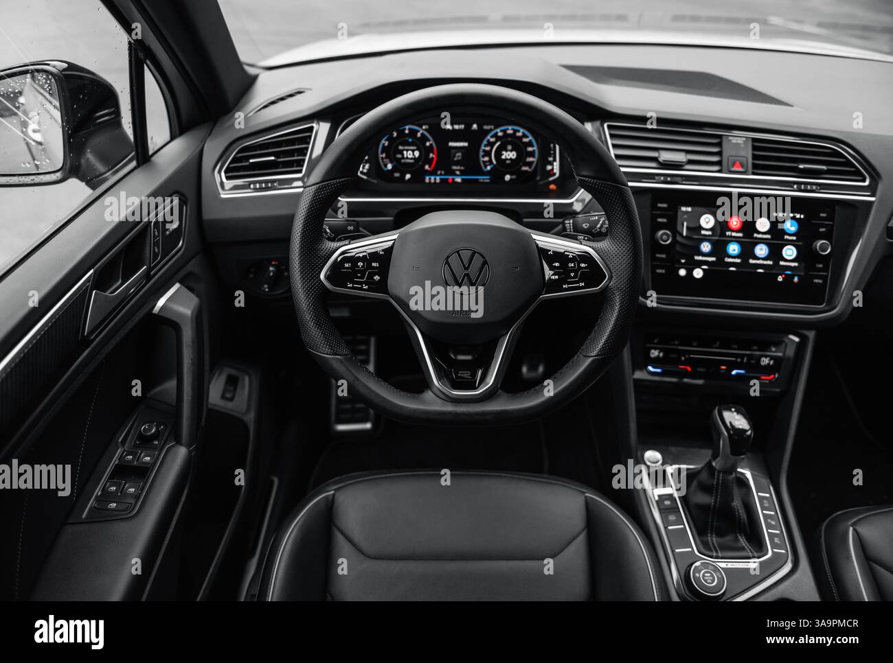 Volkswagen Tiguan interior - drivers point of view. Steering wheel and ...