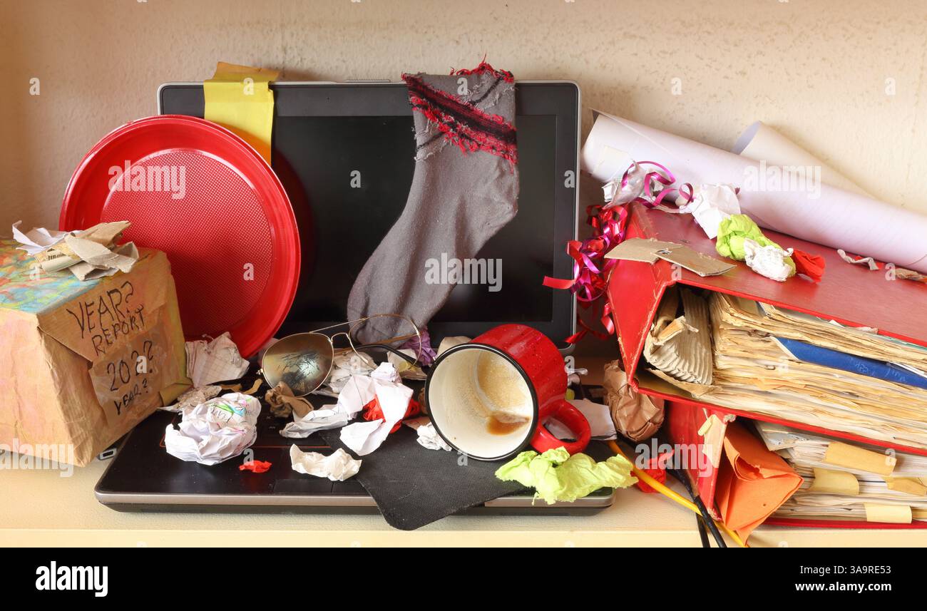 super messy work placewith file folders Stock Photo - Alamy
